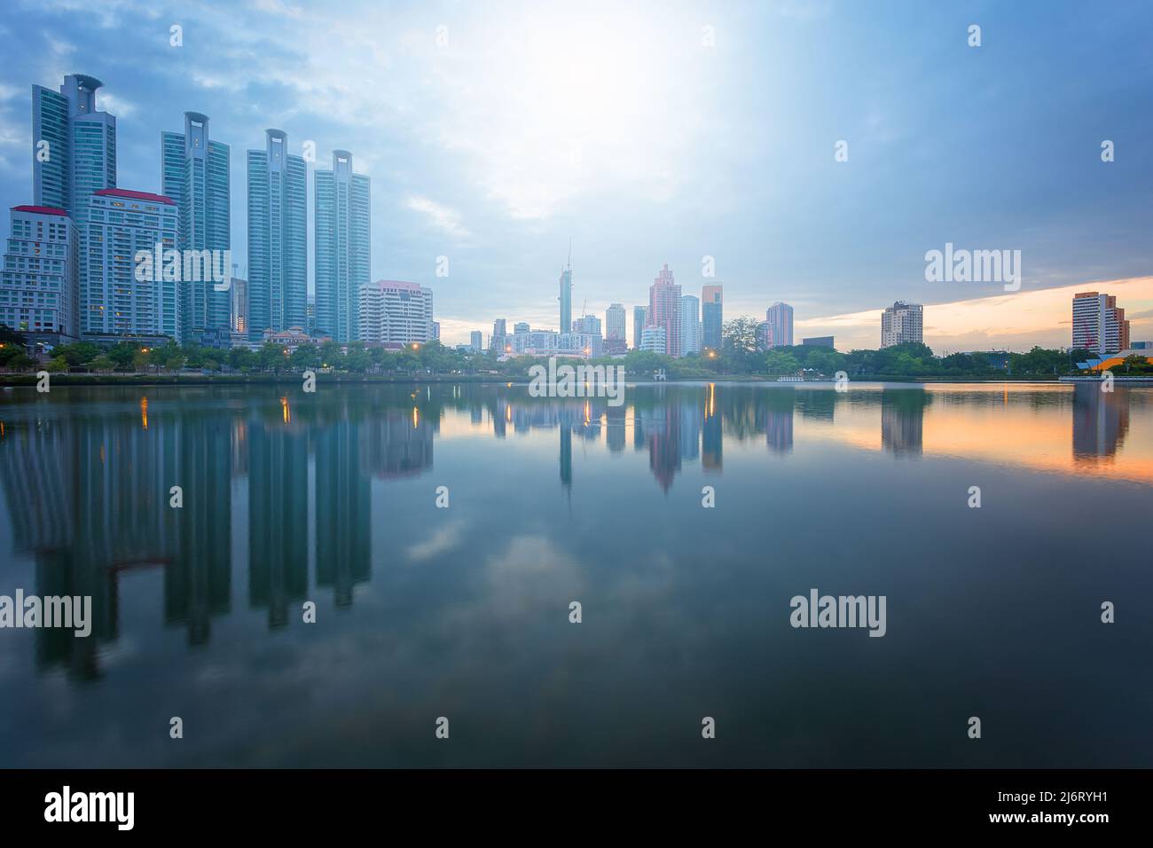 City building with water reflection before sunset background Stock ...
