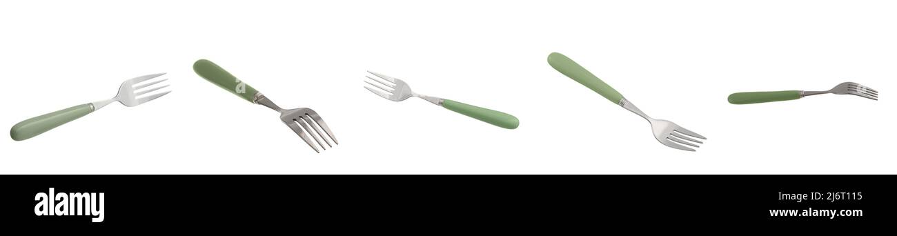 Set of flying forks on white background Stock Photo - Alamy