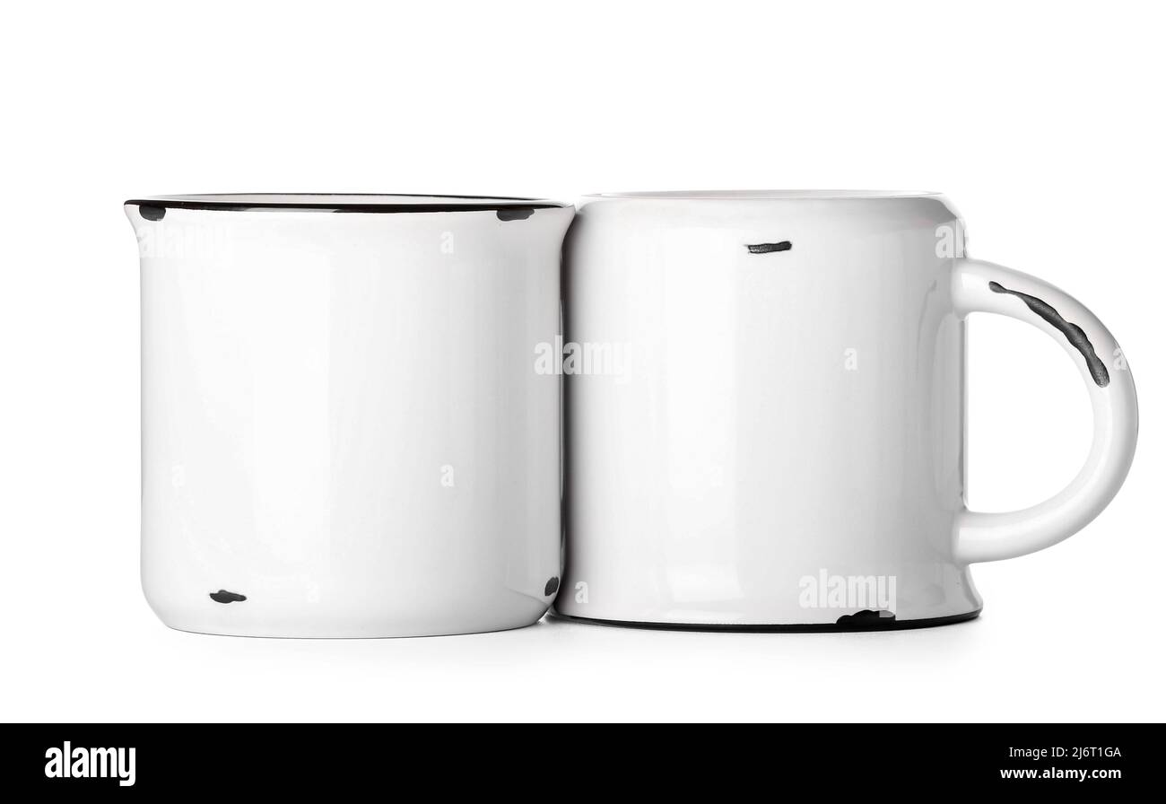 Two cups isolated on white background Stock Photo - Alamy