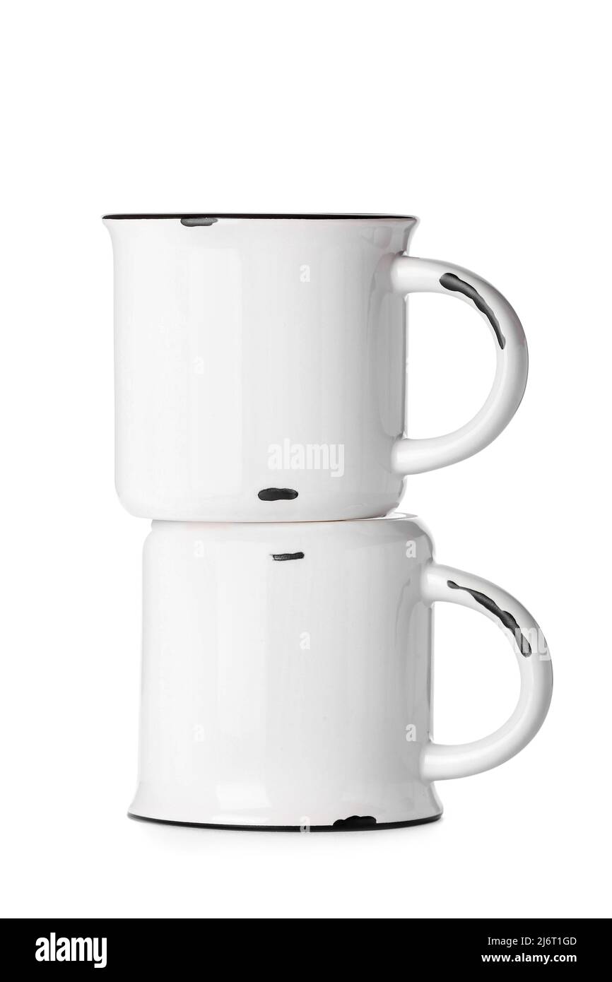 Two cups isolated on white background Stock Photo - Alamy