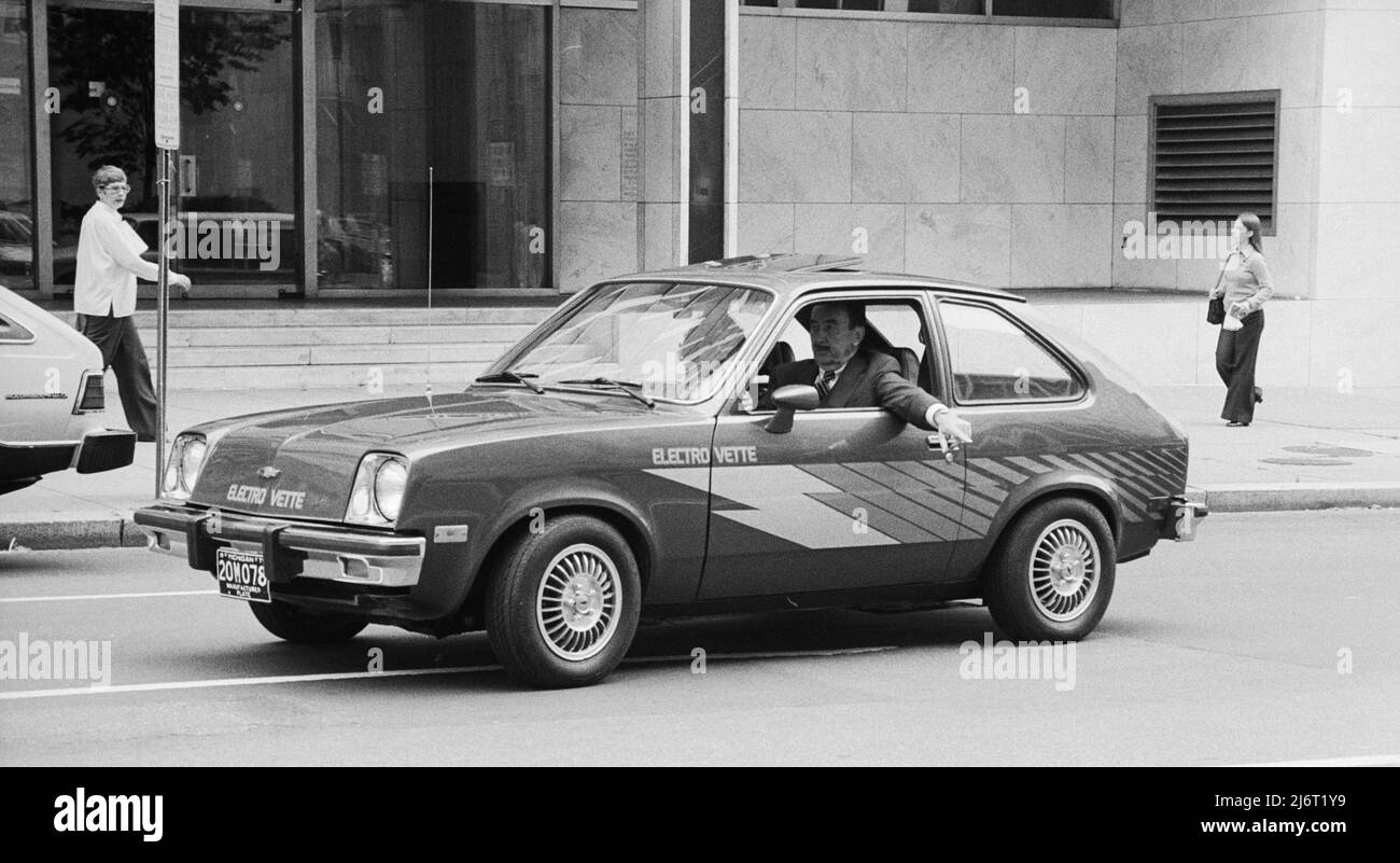 Man driving a Chevrolet Electrovette electric car, 1979 Stock Photo - Alamy