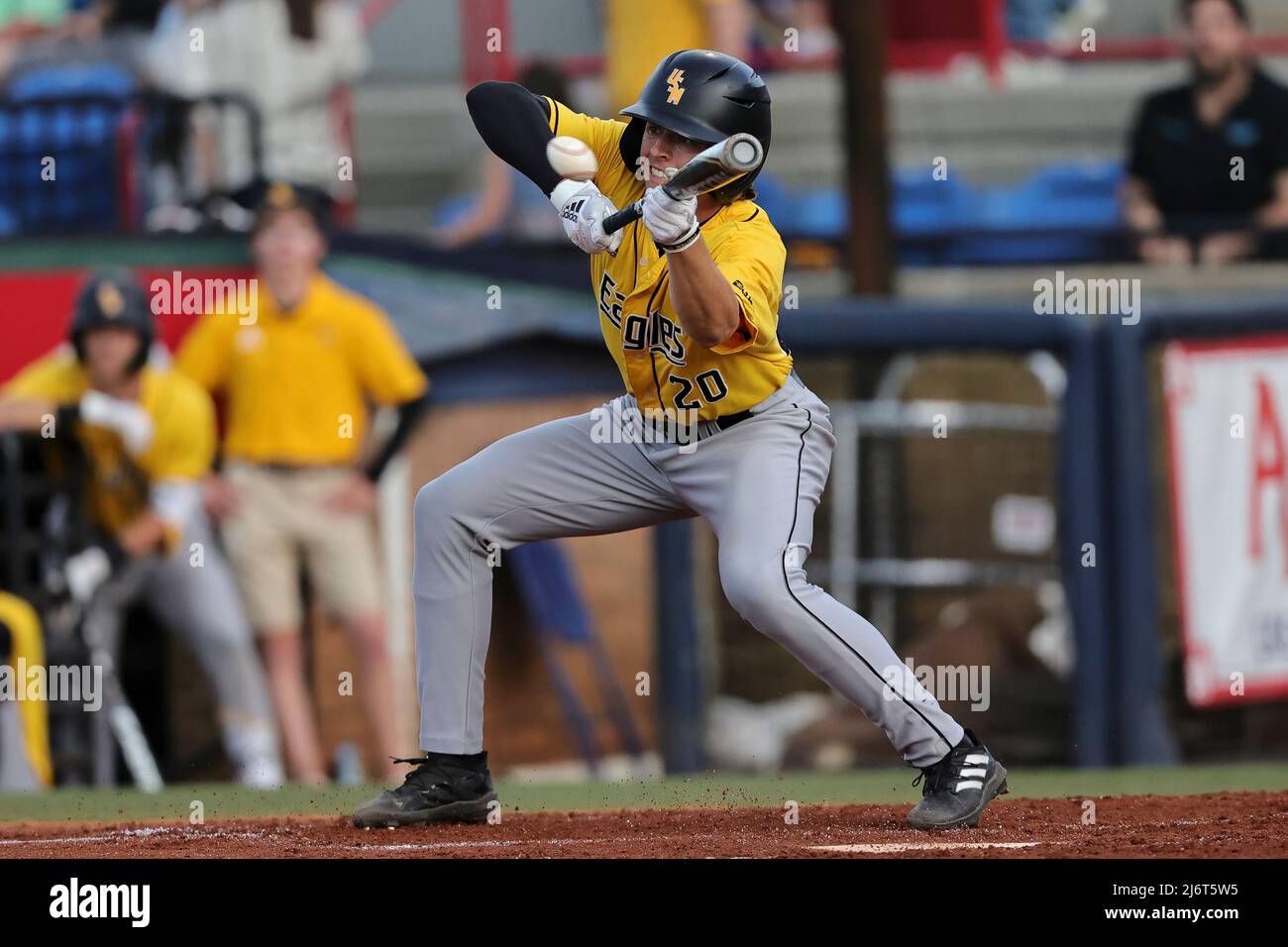 May 03, 2022: Southern Miss infielder Brady Faust (20) bunts during a ...