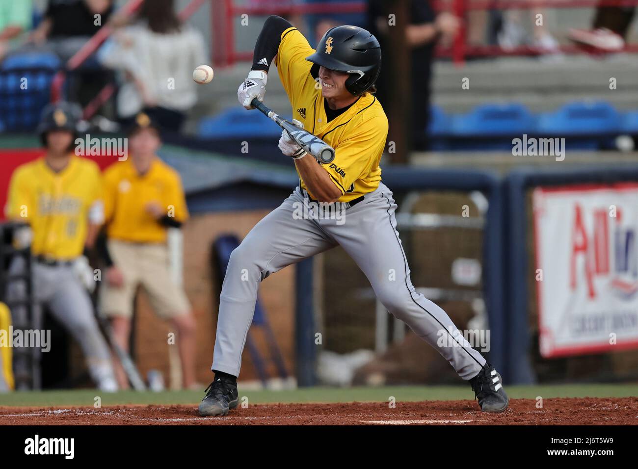 May 03, 2022: Southern Miss infielder Brady Faust (20) bunts during a ...