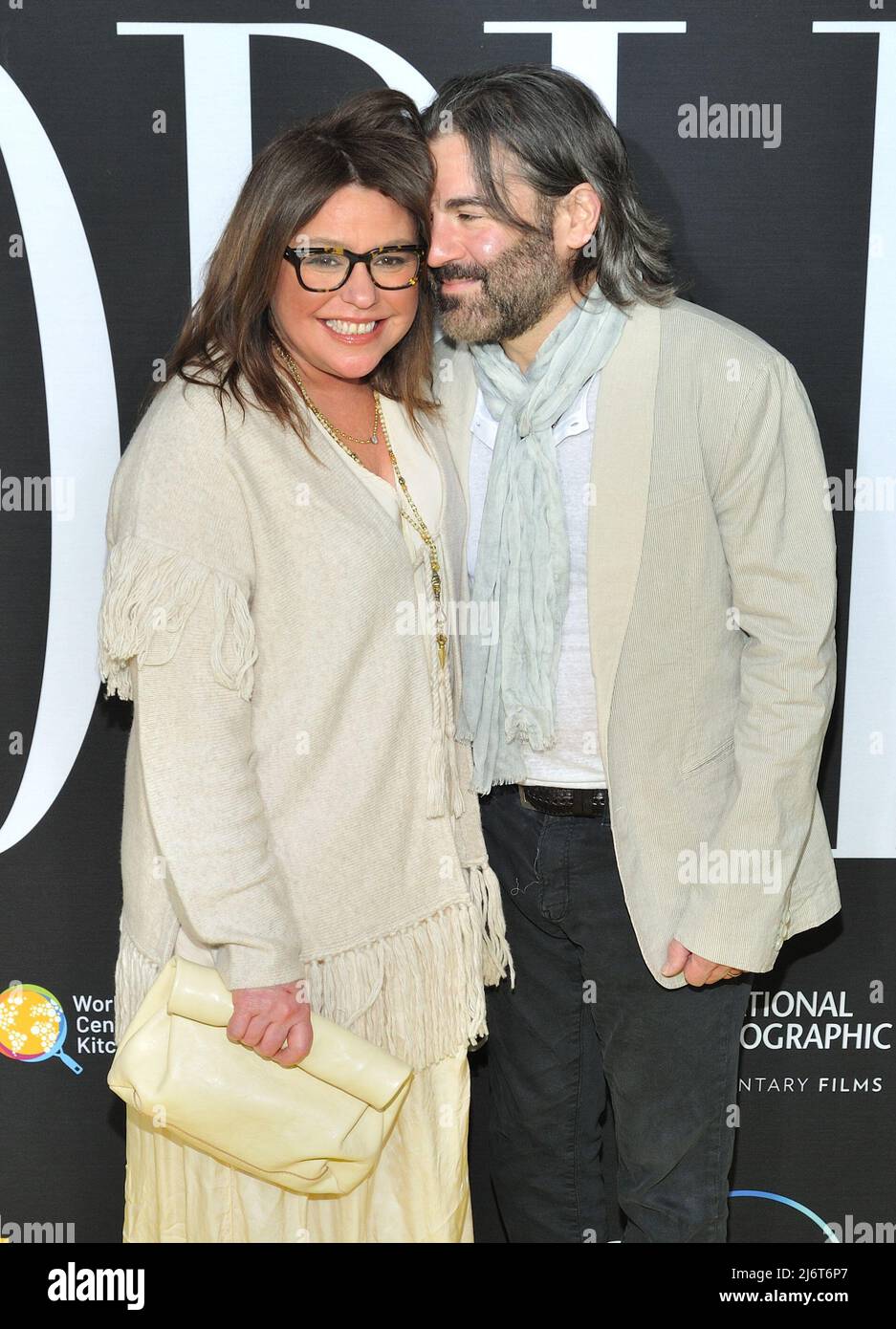 L-R: Rachael Ray and John Cusimano attend the NY premiere of We Feed ...