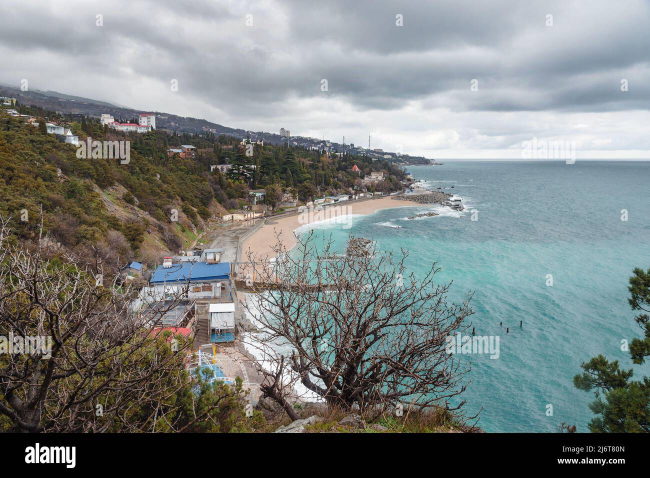 View from a rock Diva at city beach on cloudy weather dayin spring ...