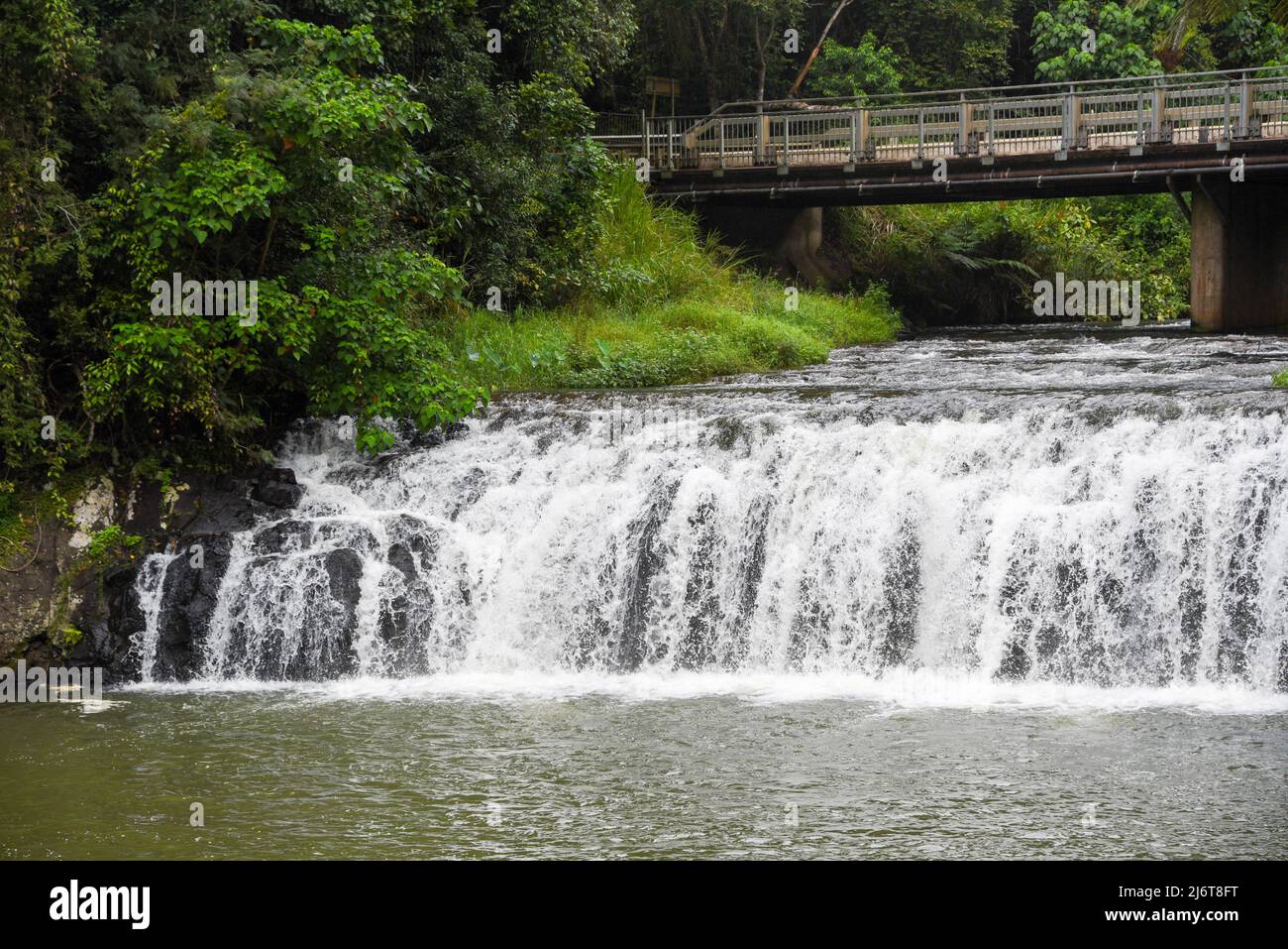Small waterfall under a bridge on the Atherton Tablelands. Queensland ...