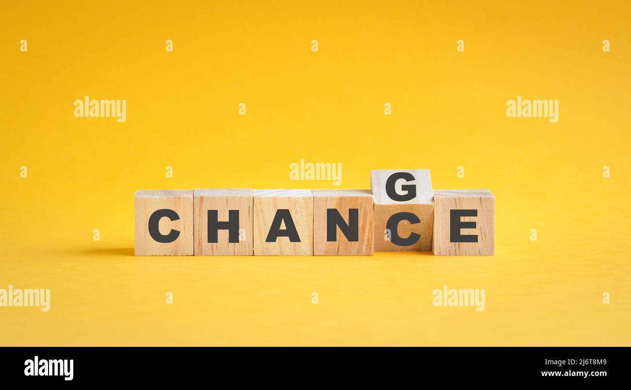 Wooden cube flip with word change to chance. Career growth and ...