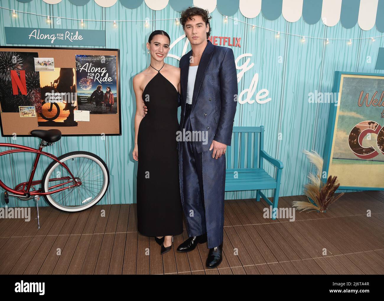 Emma Pasarow and Belmont Calmeli walking on the red carpet at the ...