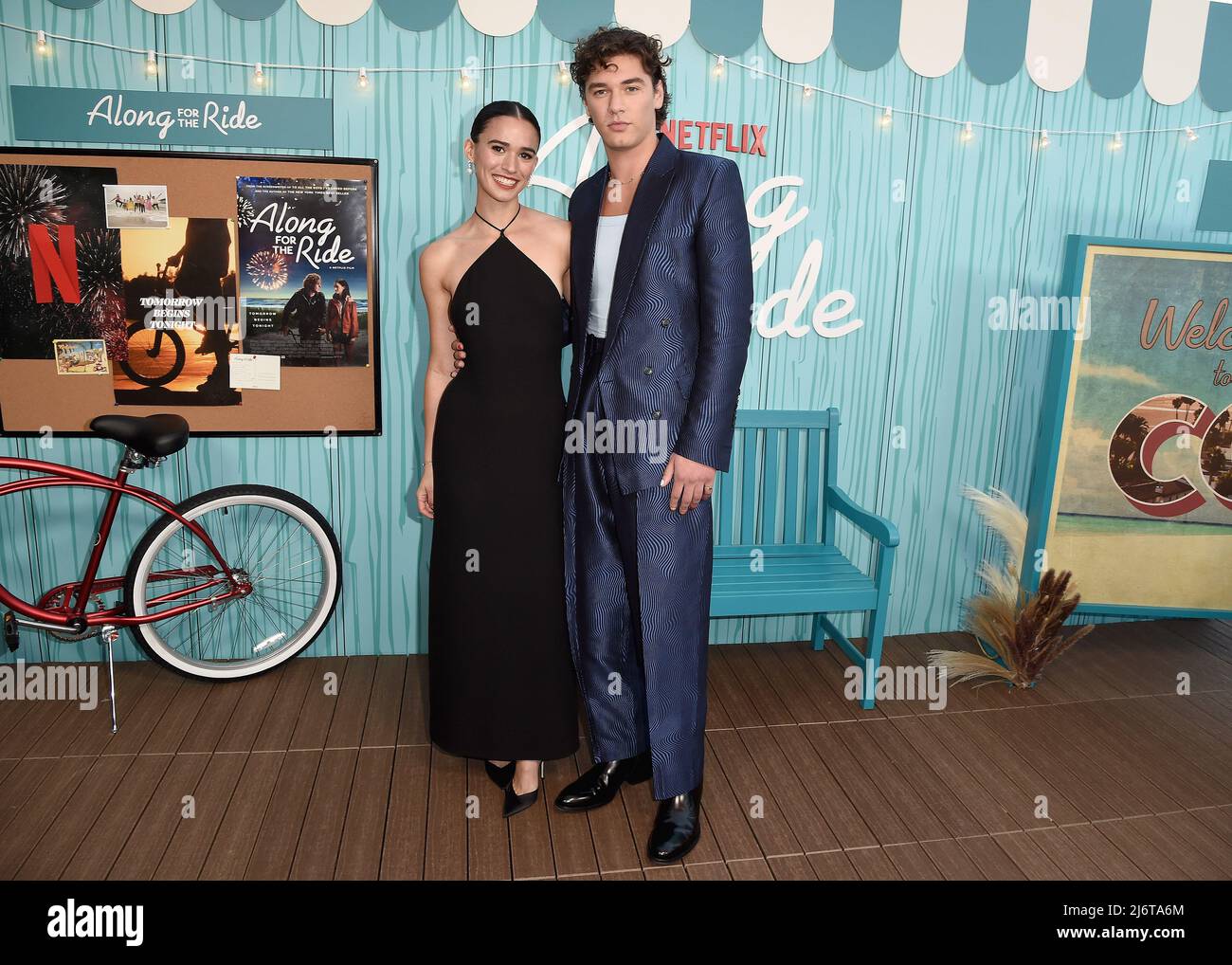 Emma Pasarow and Belmont Calmeli walking on the red carpet at the ...