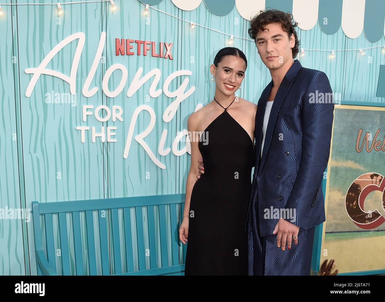 Emma Pasarow and Belmont Calmeli walking on the red carpet at the ...