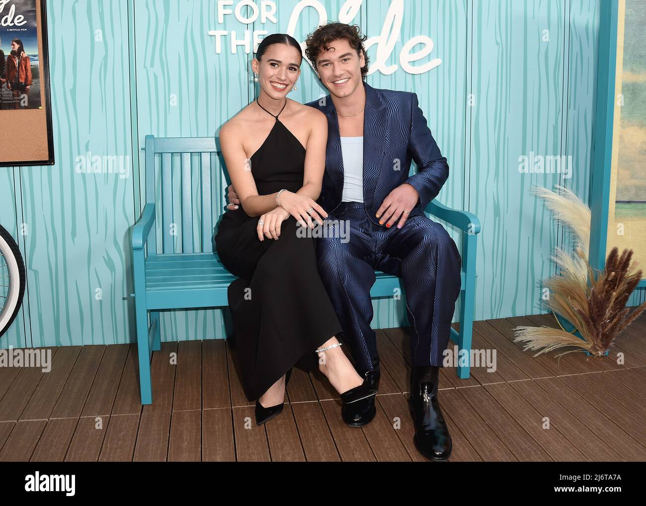 Emma Pasarow and Belmont Calmeli walking on the red carpet at the ...