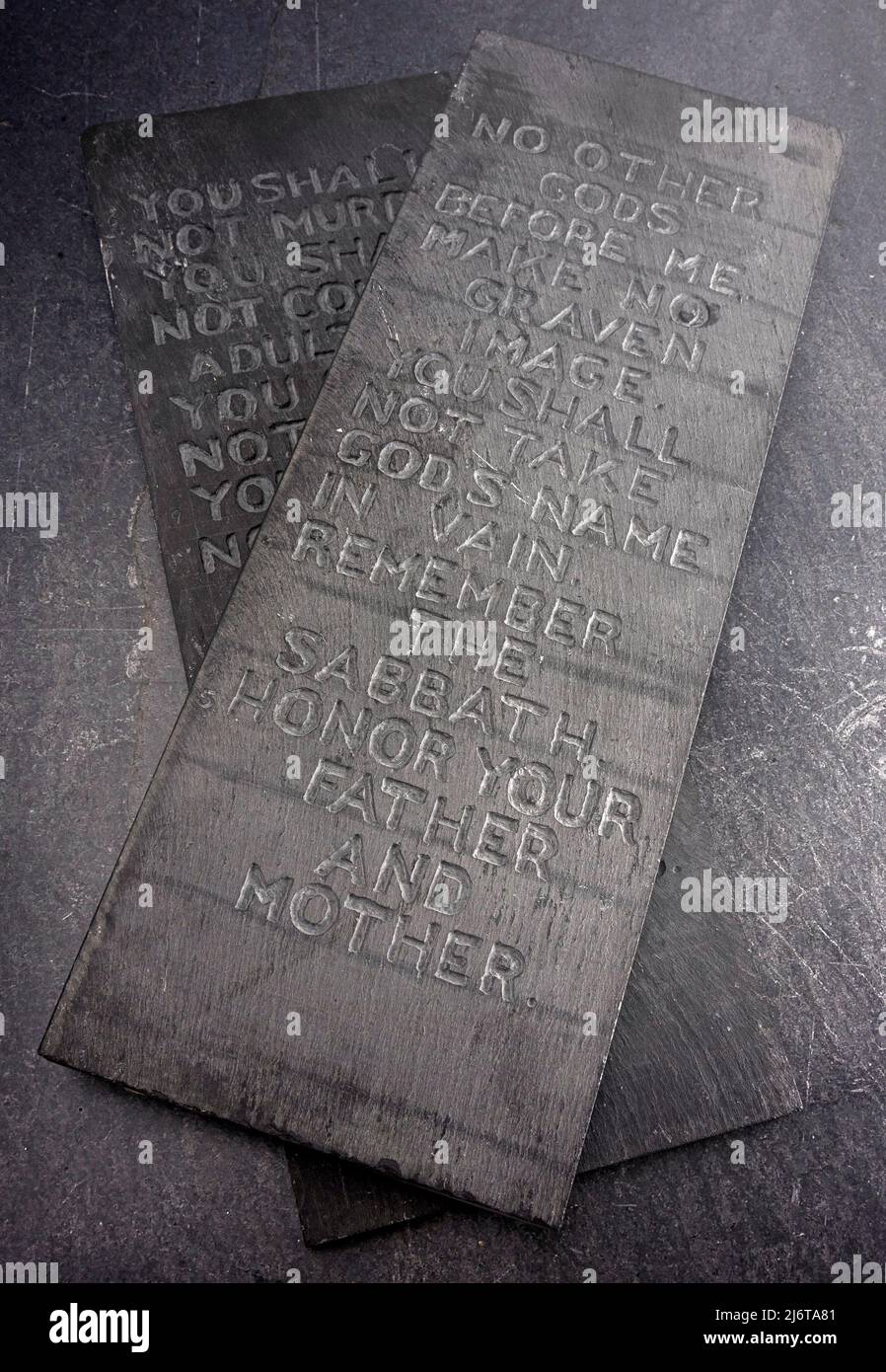 The Ten Commandments Carved into Two Black Slate Stones Stock Photo - Alamy