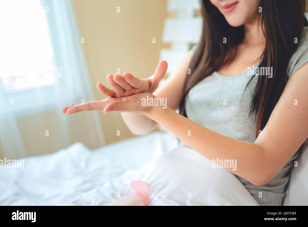 asian woman use lotion hands cream moisture and white moisturize lotion ...