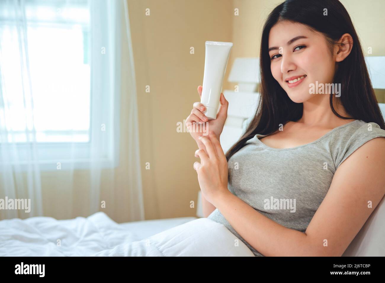 asian woman use lotion hands cream moisture and white moisturize lotion ...