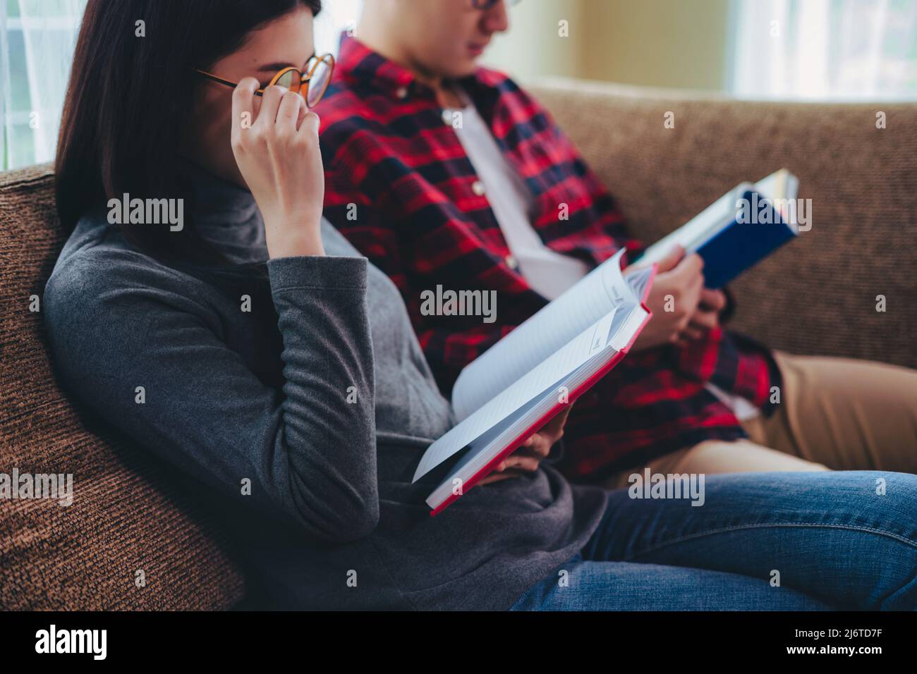 asian young couple reading a book together, People lifestyle concept ...