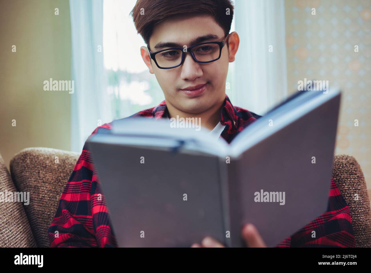 Sitting book stack learning education reading concentration hi-res ...