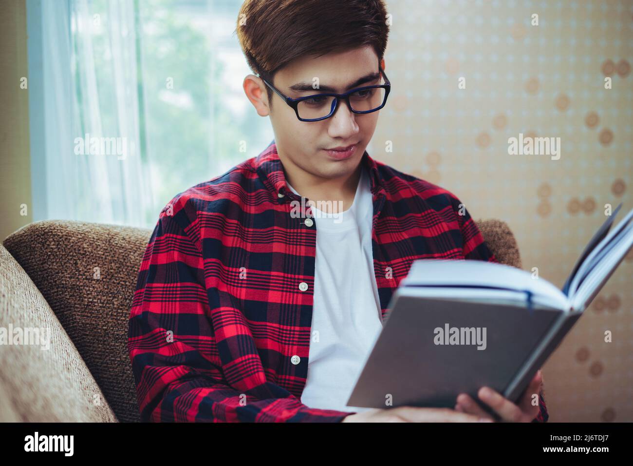 Sitting book stack learning education reading concentration hi-res ...