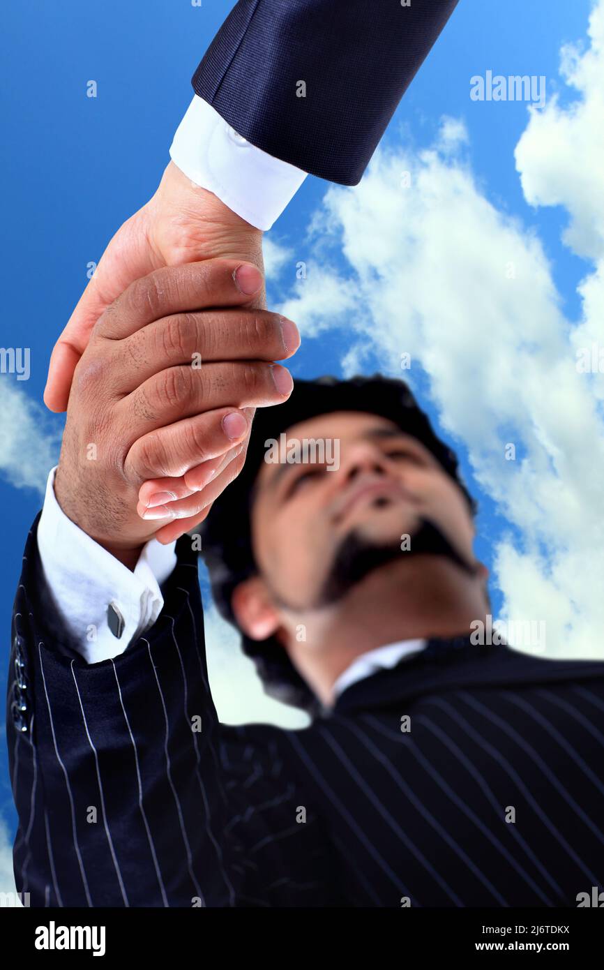 The conclusion of the transaction. Handshake Stock Photo - Alamy