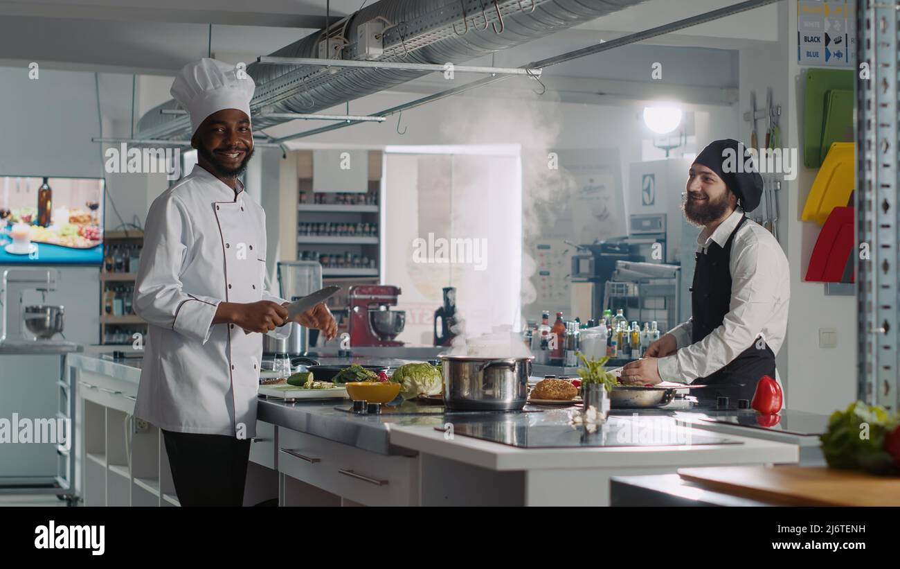Diverse culinary team recording hi-res stock photography and images - Alamy