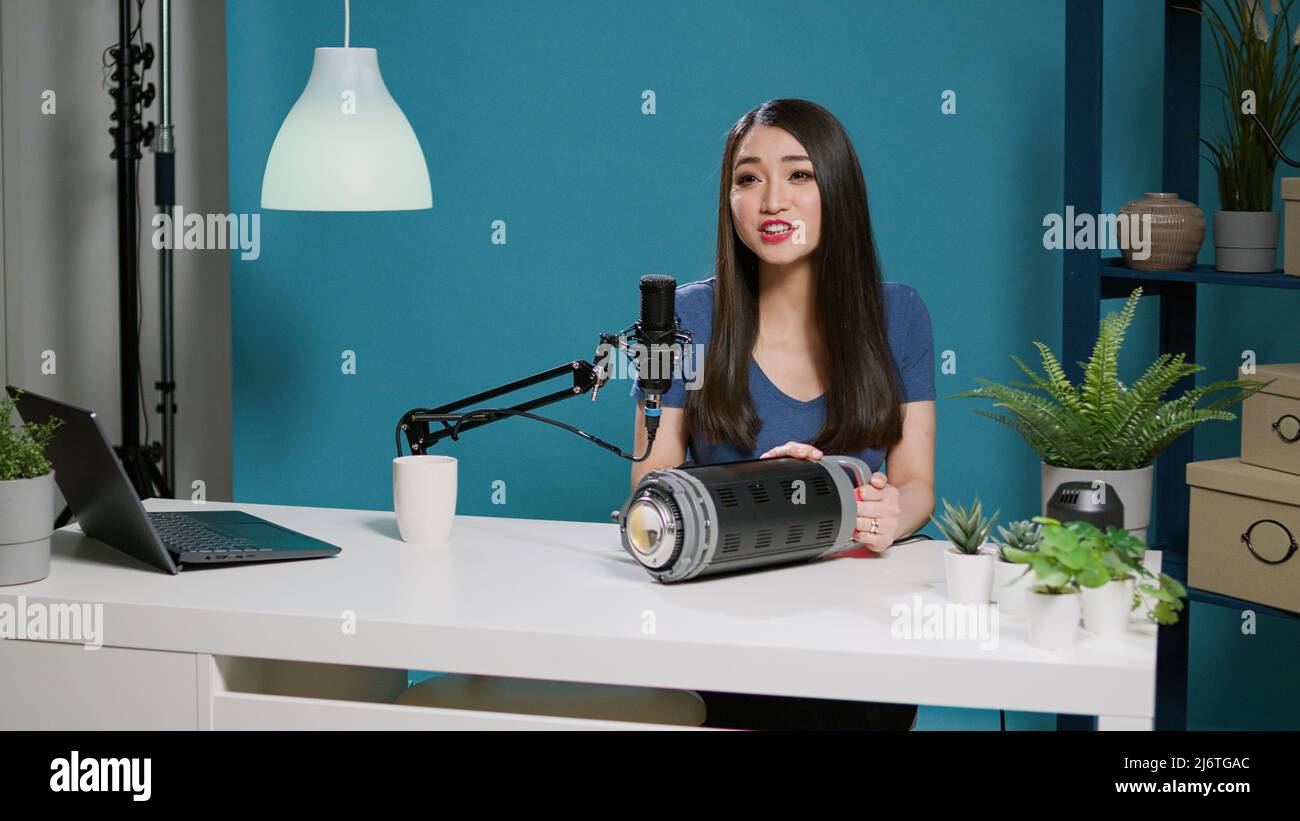 Content creator showing studio lighting on live broadcast video ...