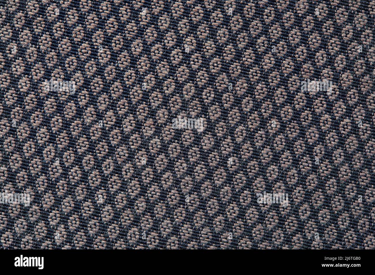 Knitted texture. Texture of jacquard fabric with gray geometric pattern ...