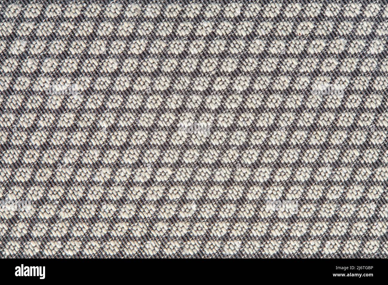 Knitted texture. Texture of jacquard fabric with gray geometric pattern ...