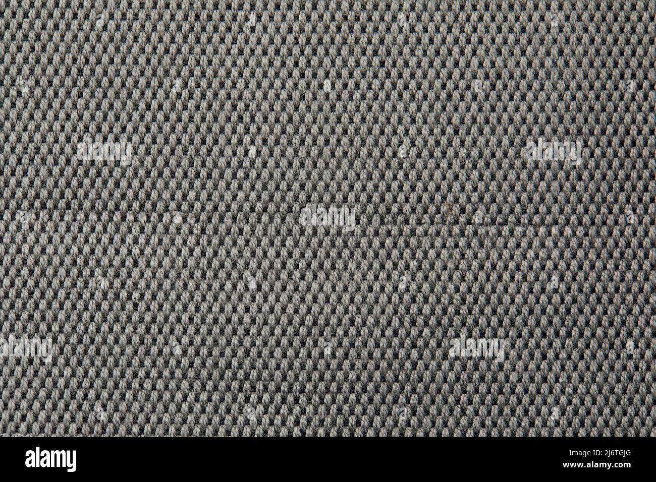 Knitted texture. Texture of jacquard fabric with gray geometric pattern ...
