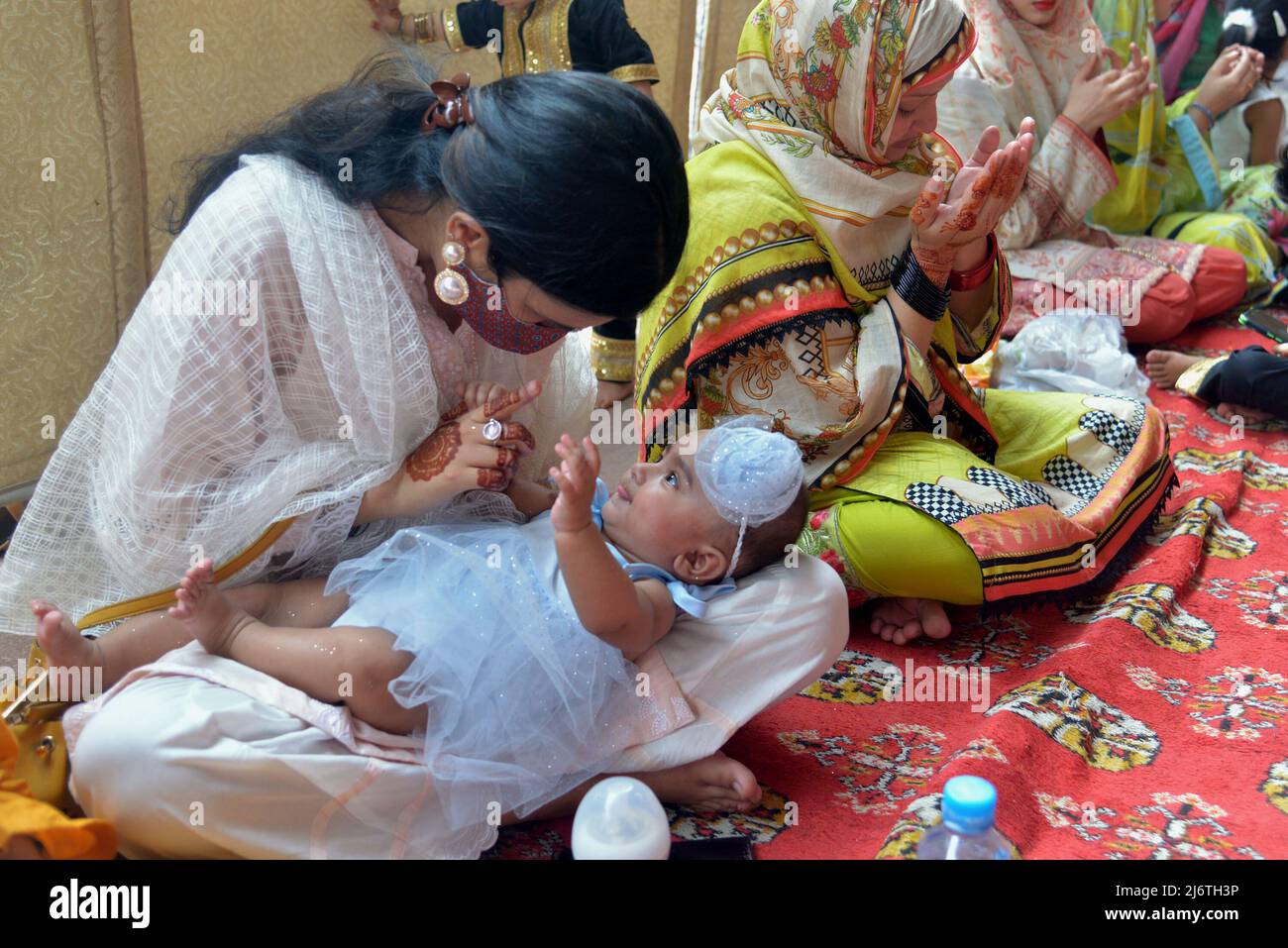 Pakistani devotees Muslim offering special morning prayers on the eve of Eid al-Fitr that marks ...