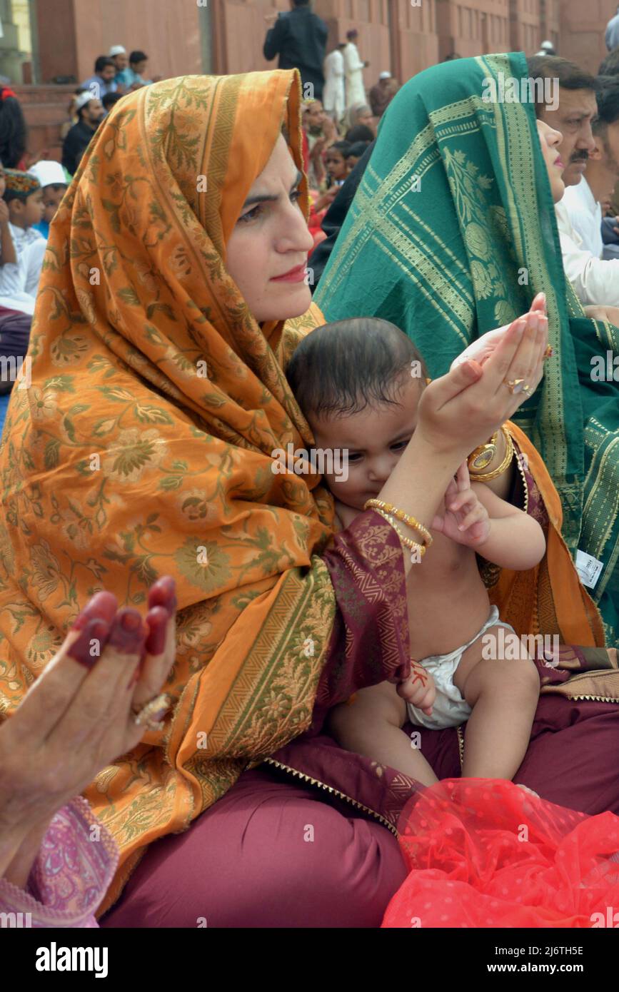 Pakistani devotees Muslim offering special morning prayers on the eve of Eid al-Fitr that marks ...