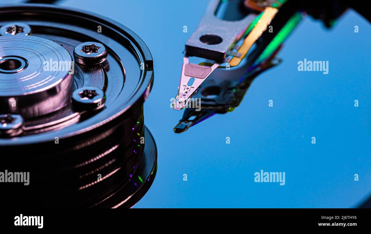 Macro Close up of inside of magnetic Hard Disc Drive with mirror ...
