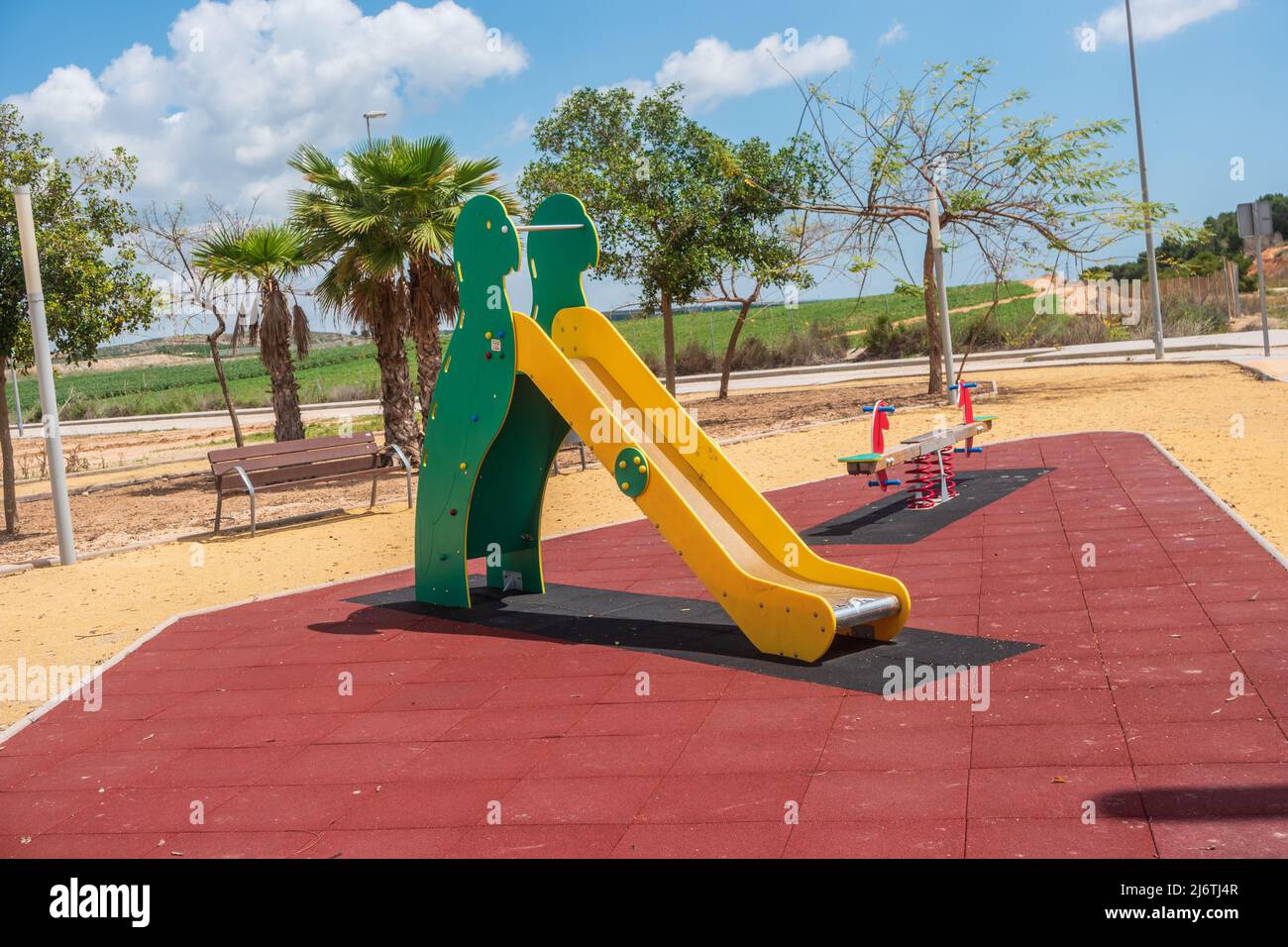 Slide seesaw hi-res stock photography and images - Alamy
