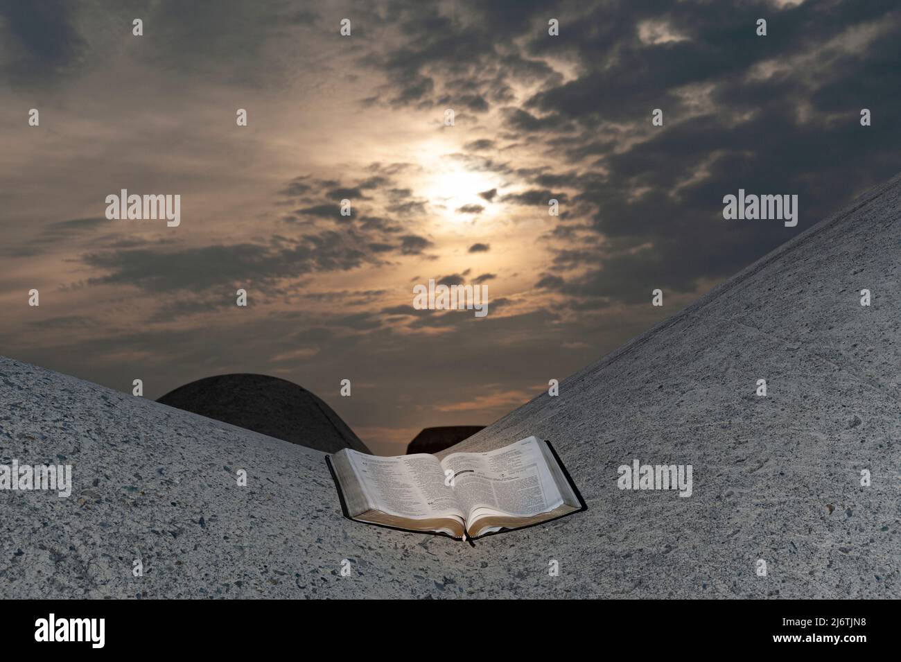 Open bible on top of a rock hi-res stock photography and images - Alamy