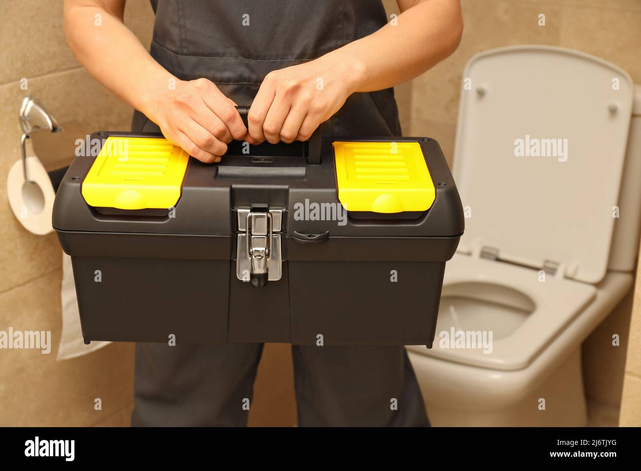 Concept of occupation, young woman plumber with tools box Stock Photo ...