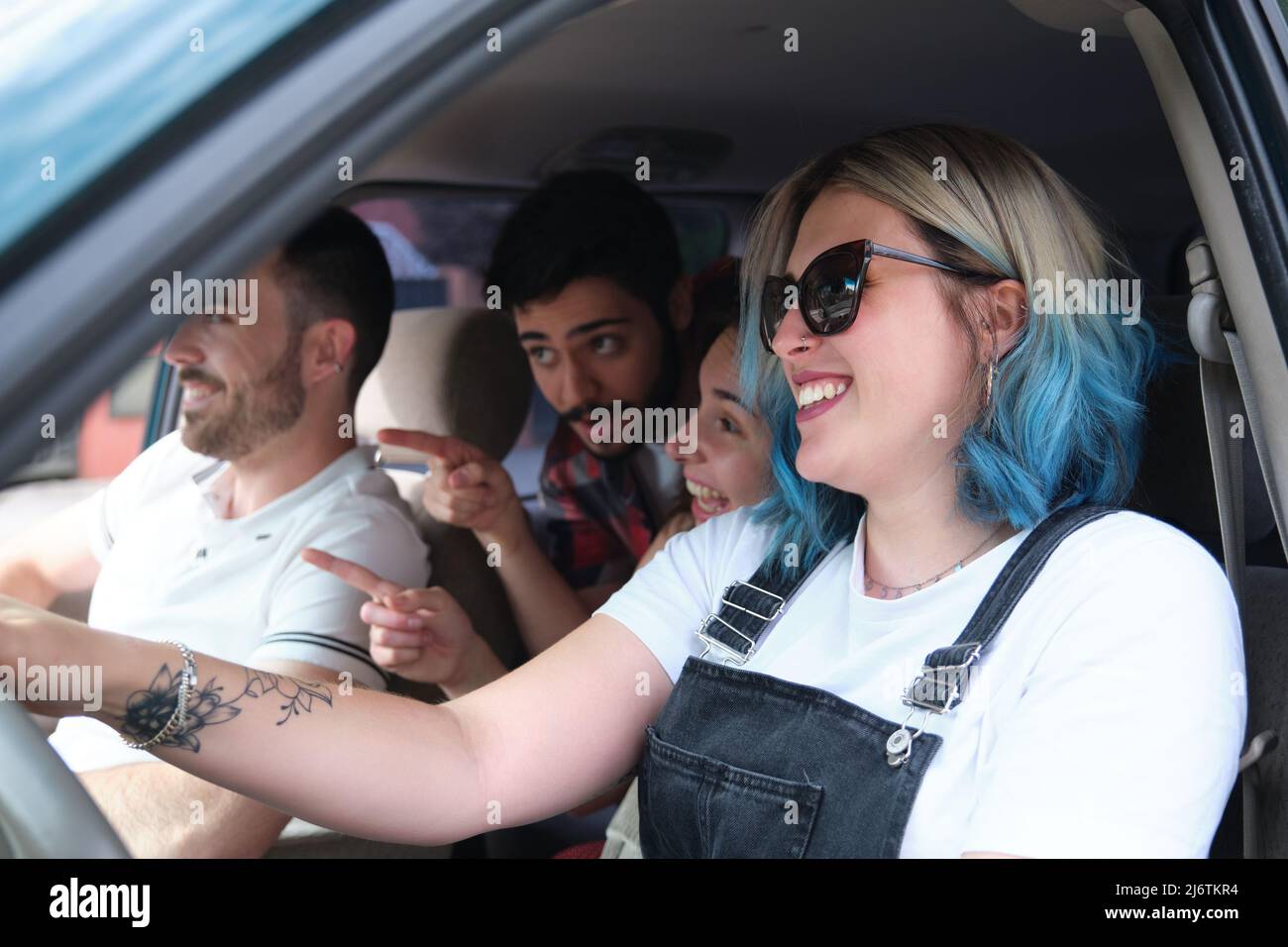 Group making fun pointing hi-res stock photography and images - Alamy