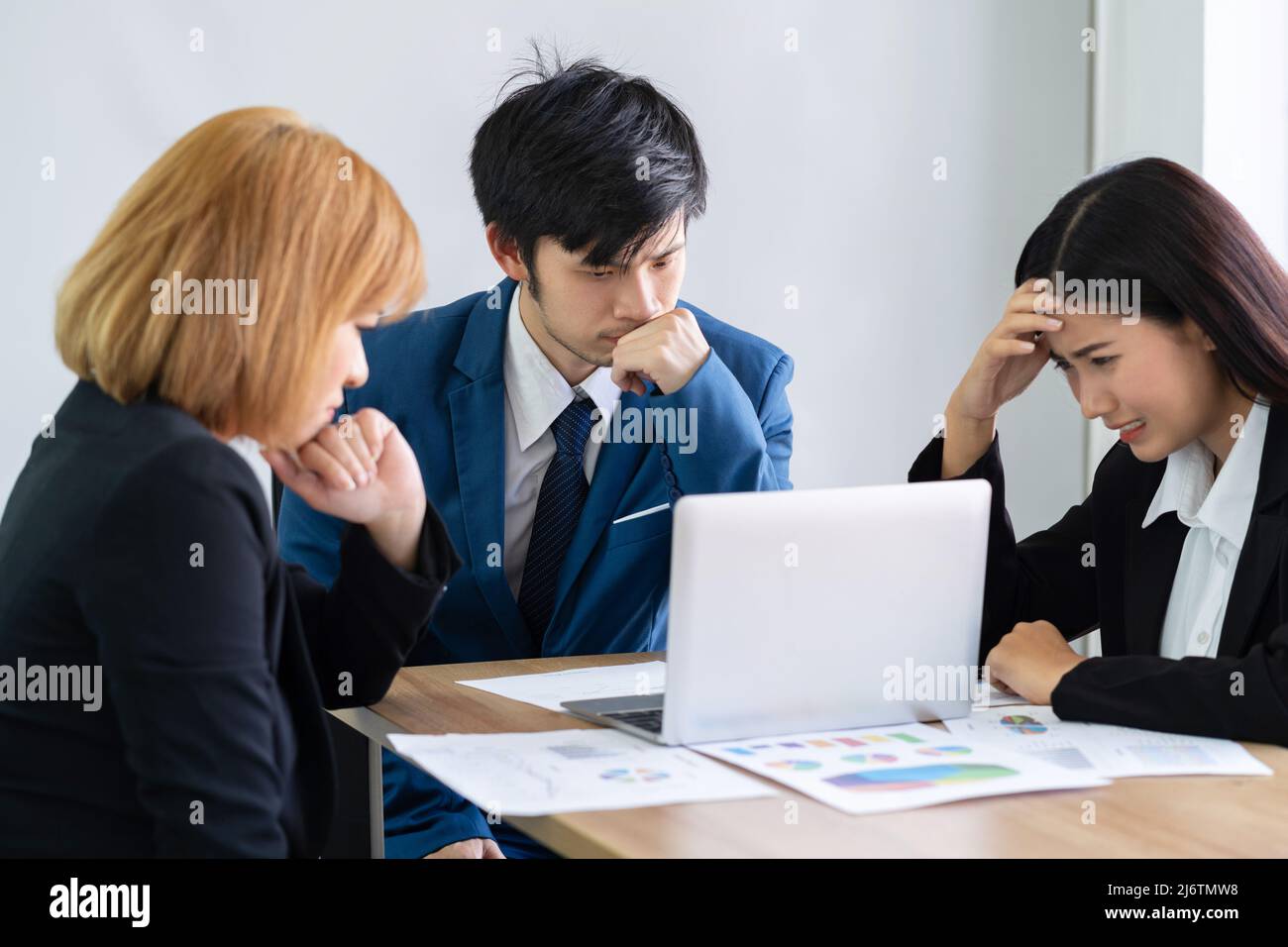 asian man and woman work stress and problems Stock Photo - Alamy
