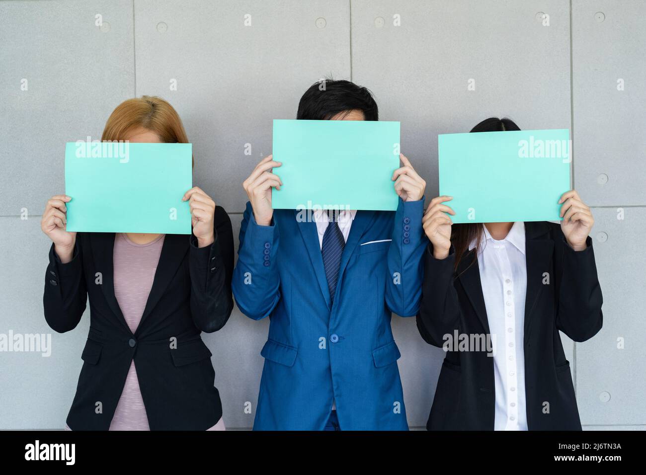 asian man and woman hand showing paper Stock Photo - Alamy