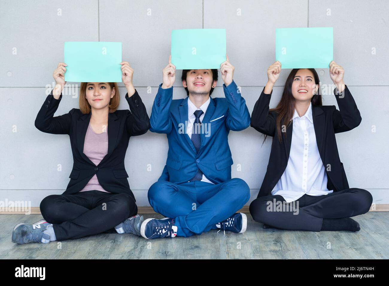 asian man and woman hand showing paper Stock Photo - Alamy