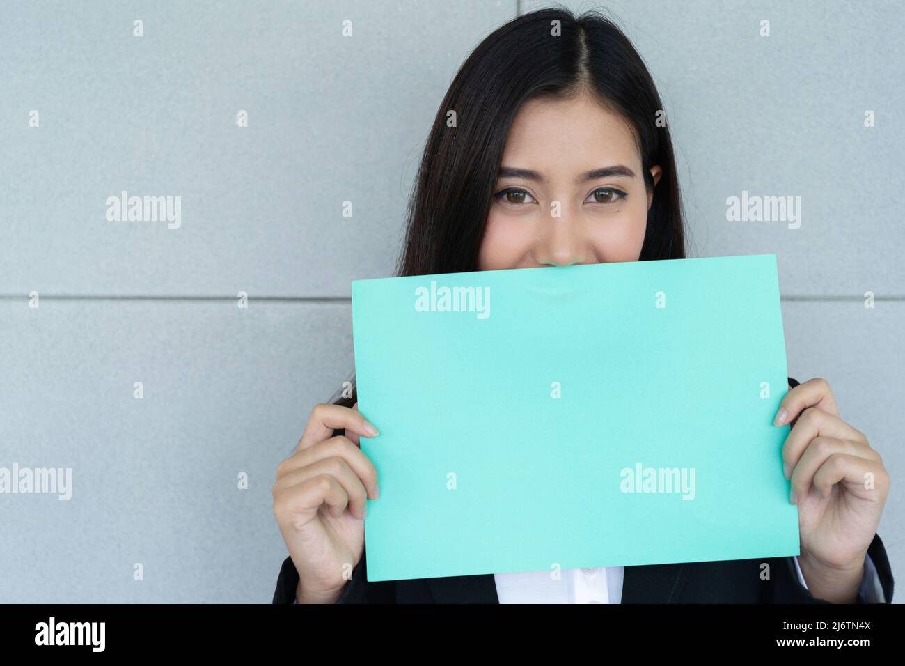 asian woman hand showing paper Stock Photo - Alamy