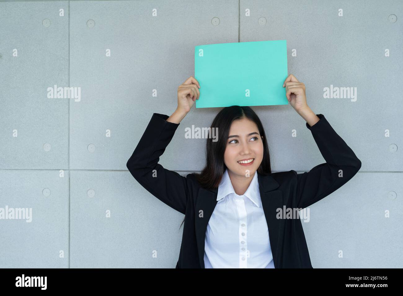asian woman hand showing paper Stock Photo - Alamy