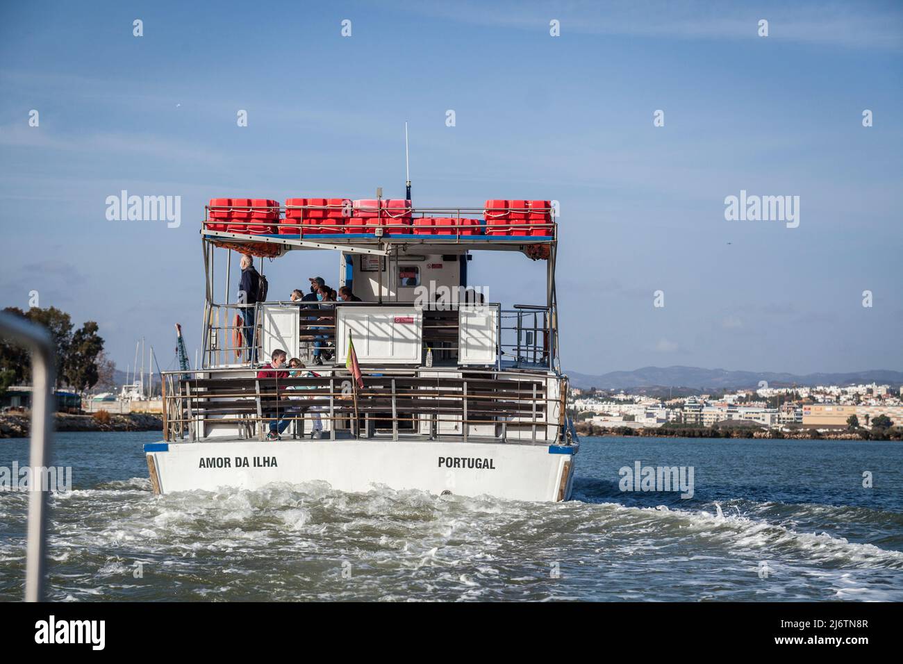 excursion boat "Amor da Ilha" right in front of our solar boat in ...
