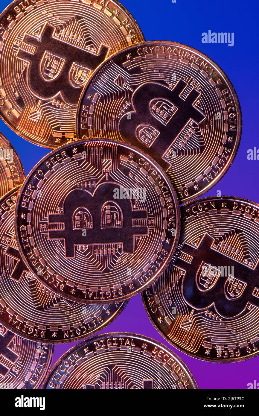 Close up photo of gold plated bitcoins symbolizing the bit coin market ...