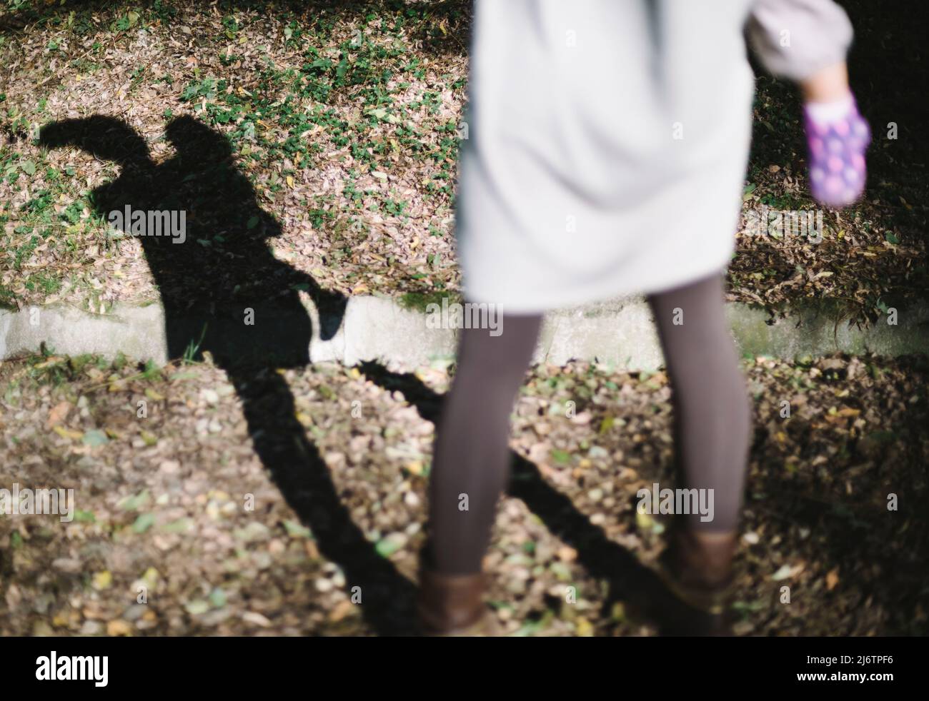 Shadow of mother and daughter Stock Photo - Alamy