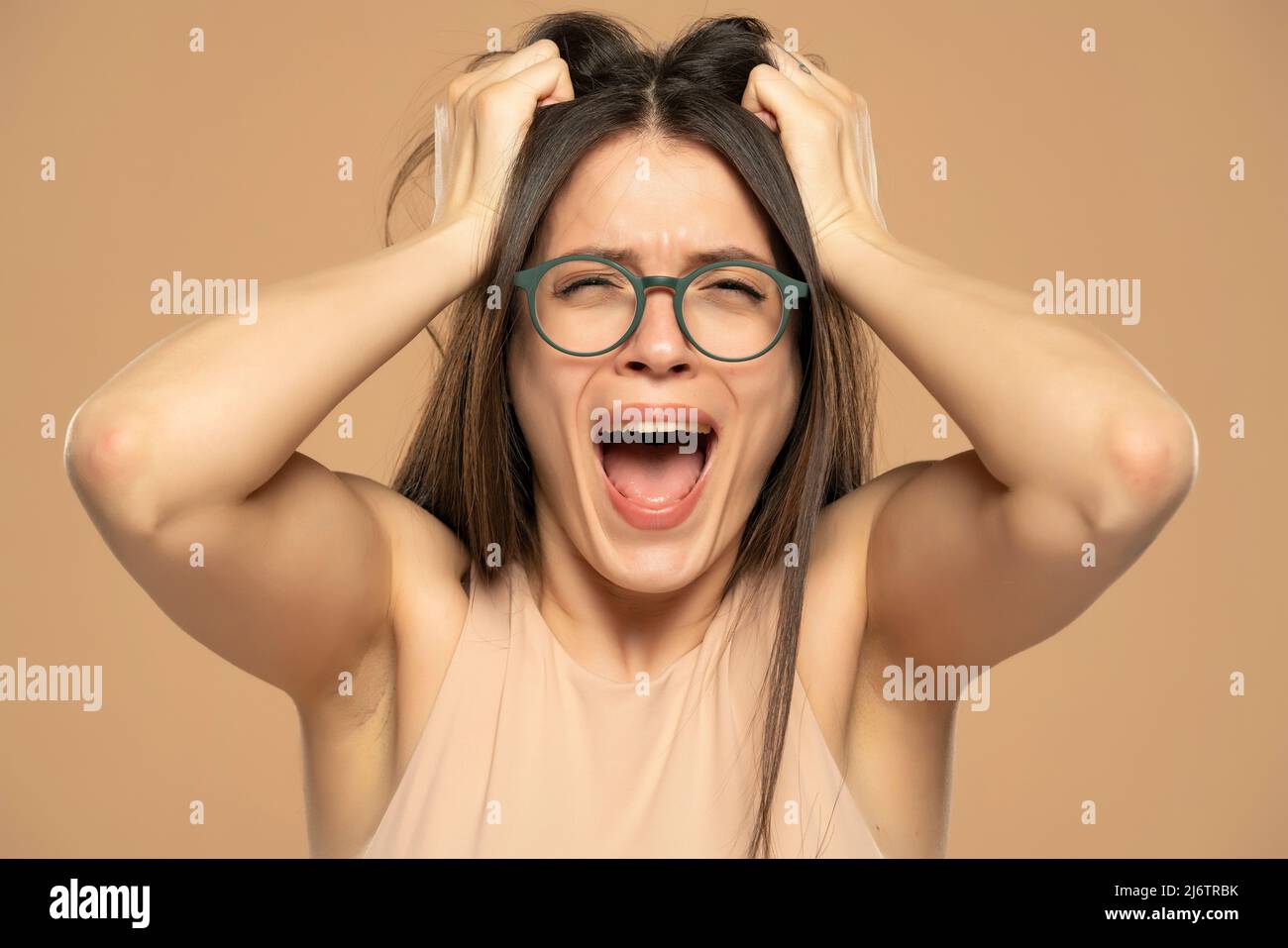 Closeup Portrait Stressed Frustrated Woman With Glasses Screaming