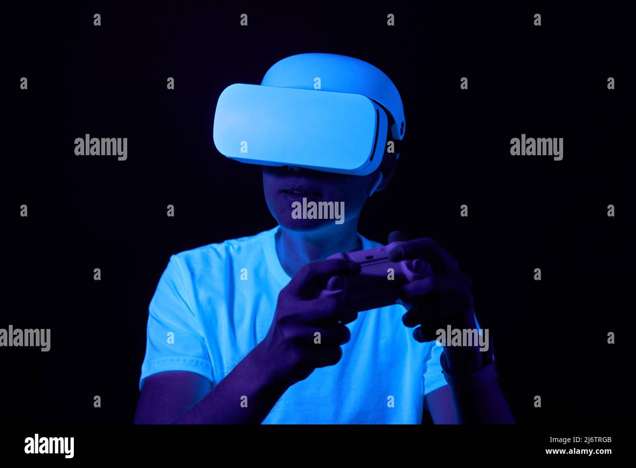 Man with virtual reality headset is playing game. Concept of virtual ...