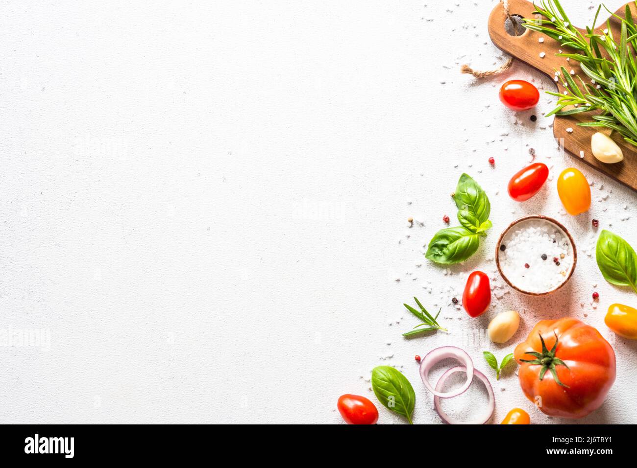 Food cooking background on white stone table Stock Photo - Alamy