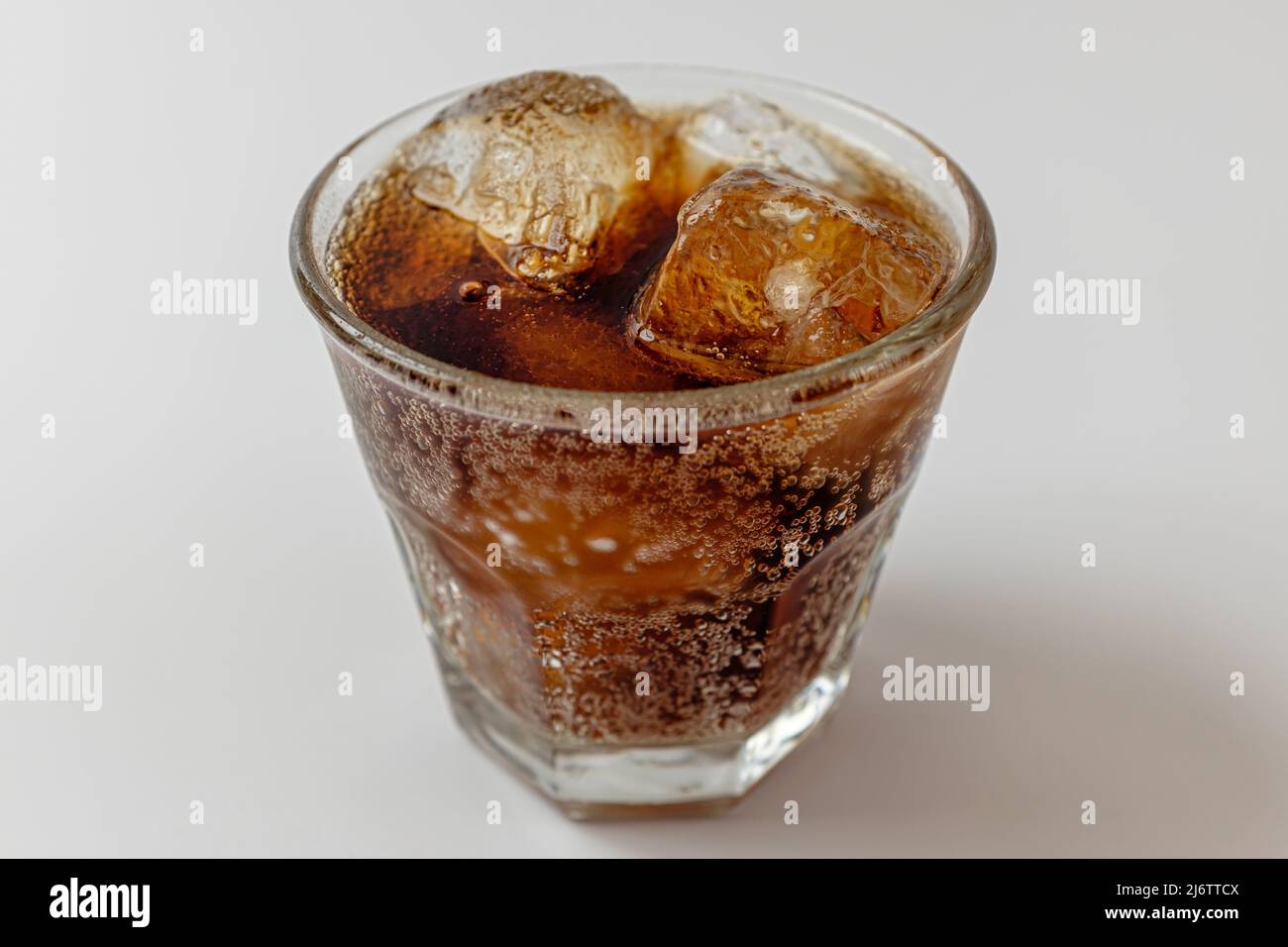 cola on a white background Stock Photo - Alamy