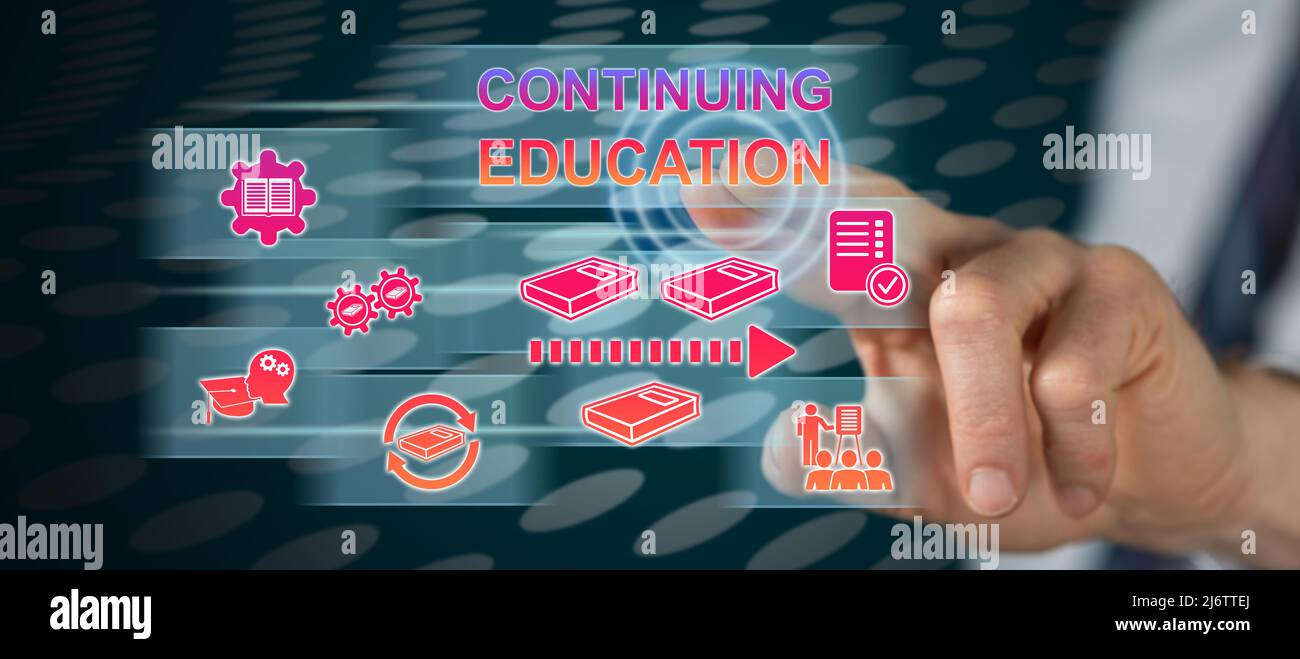 Man touching a continuing education concept on a touch screen with his ...