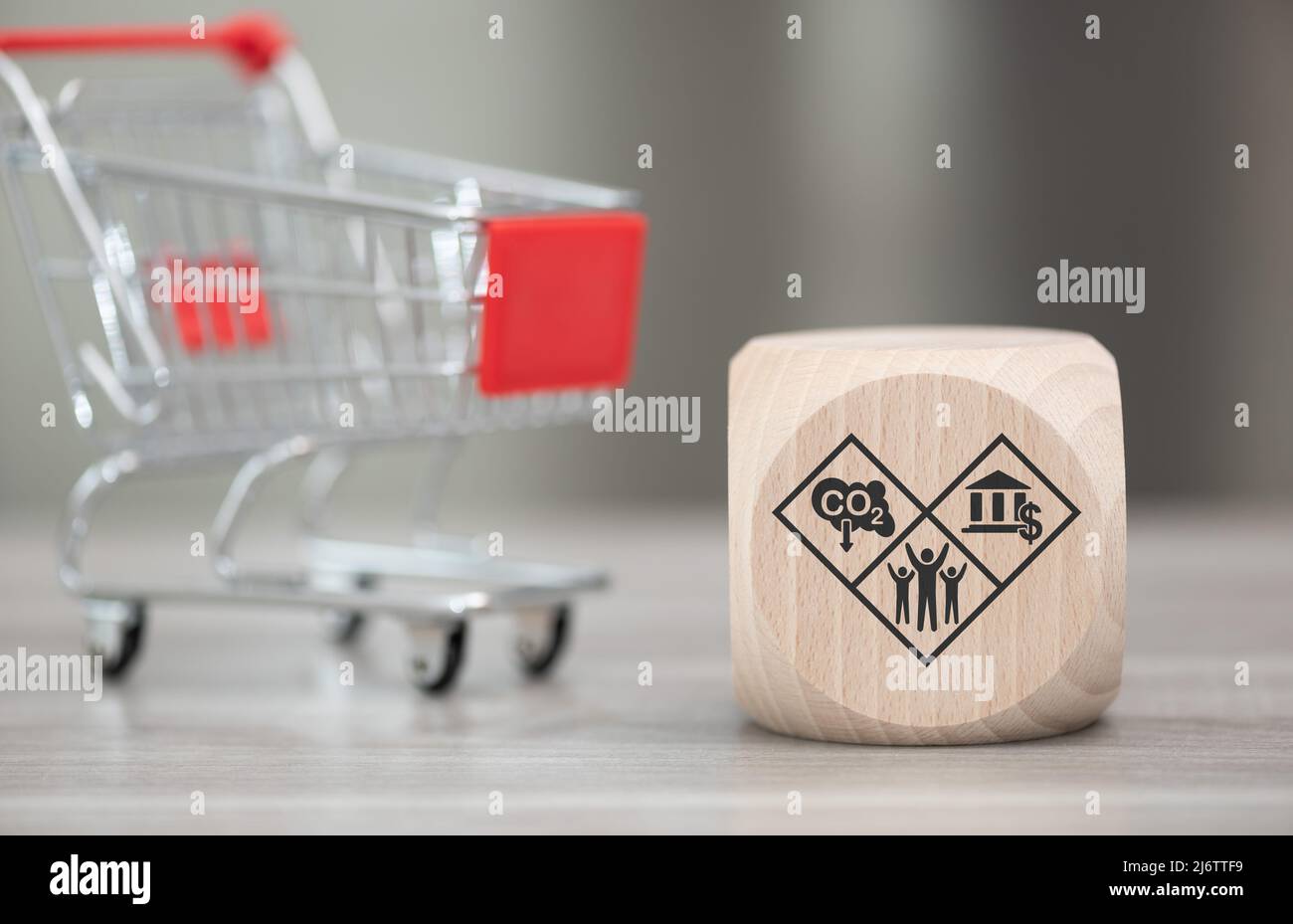 Wooden block with symbol of esg concept and trolley on background Stock ...