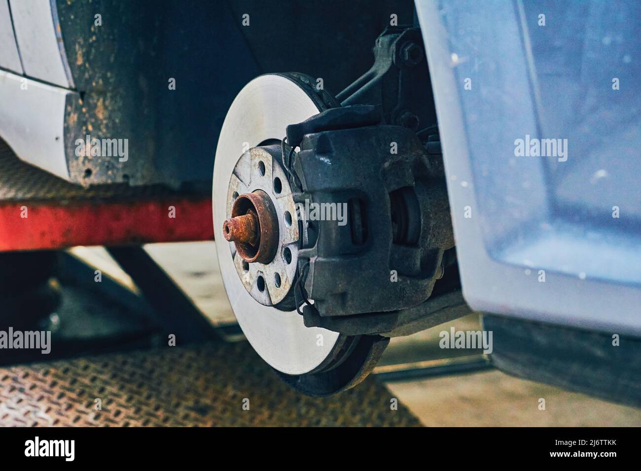 Service for the repair and replacement of a car wheel at a tire station ...