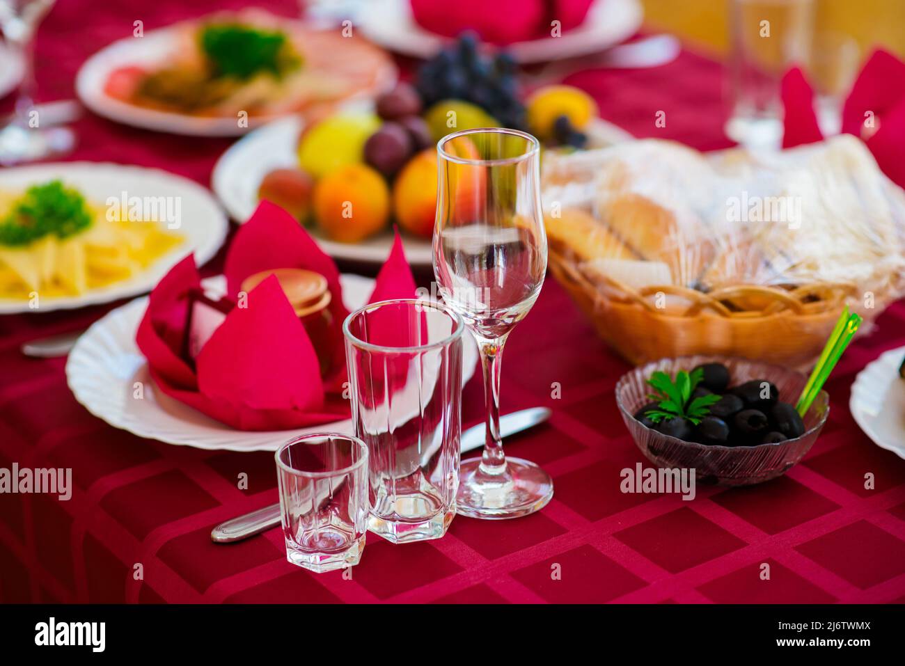 Beautiful table setting, with glasses and utensils Stock Photo - Alamy